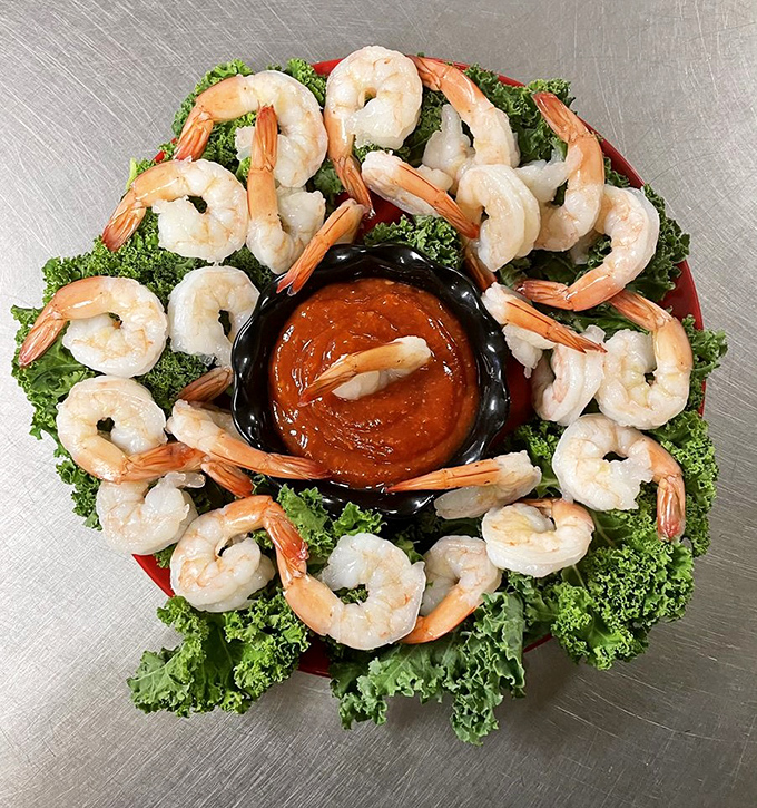 Cocktail shrimp arranged like edible artwork, because presentation matters even when you're about to devour everything immediately.