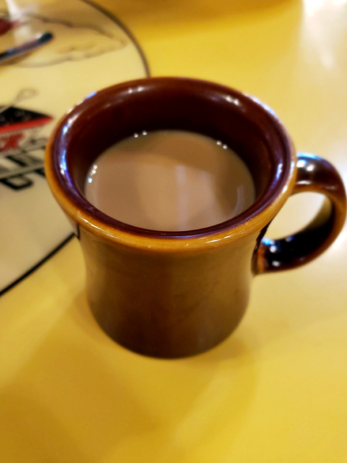 The unsung hero of every great breakfast: a sturdy mug of no-nonsense diner coffee that promises to transform you from zombie to human.