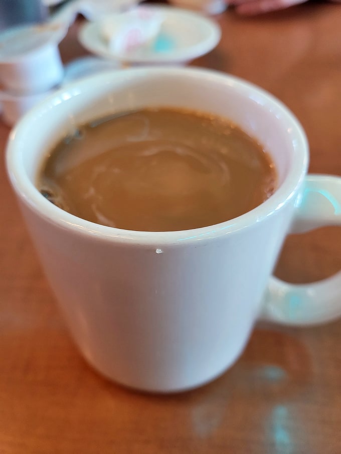Coffee in a classic white mug&mdash;the unsung hero of every diner experience. The elixir that turns morning grumps into functioning humans. 