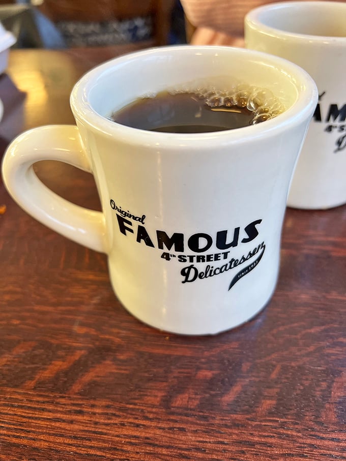 The coffee comes in mugs sturdy enough to withstand enthusiastic table-tapping when you spot an old friend across the room.