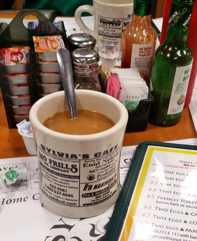 The coffee mug says "NO FRILLS" but delivers all thrills. In a world of complicated coffee concoctions, there's something revolutionary about a perfect, honest cup of diner joe.