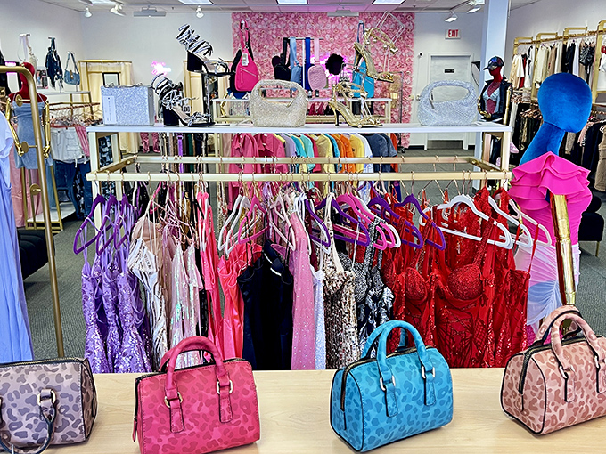 Dress department rainbow: where prom dreams, wedding guest outfits, and "just because I deserve it" purchases hang in colorful harmony.