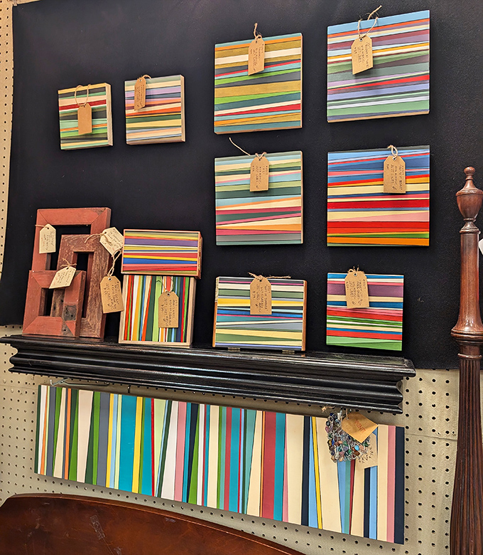 Colorful striped canvases line up like well-dressed soldiers, each one a modern pop against the vintage surroundings. Art that doesn't take itself too seriously.