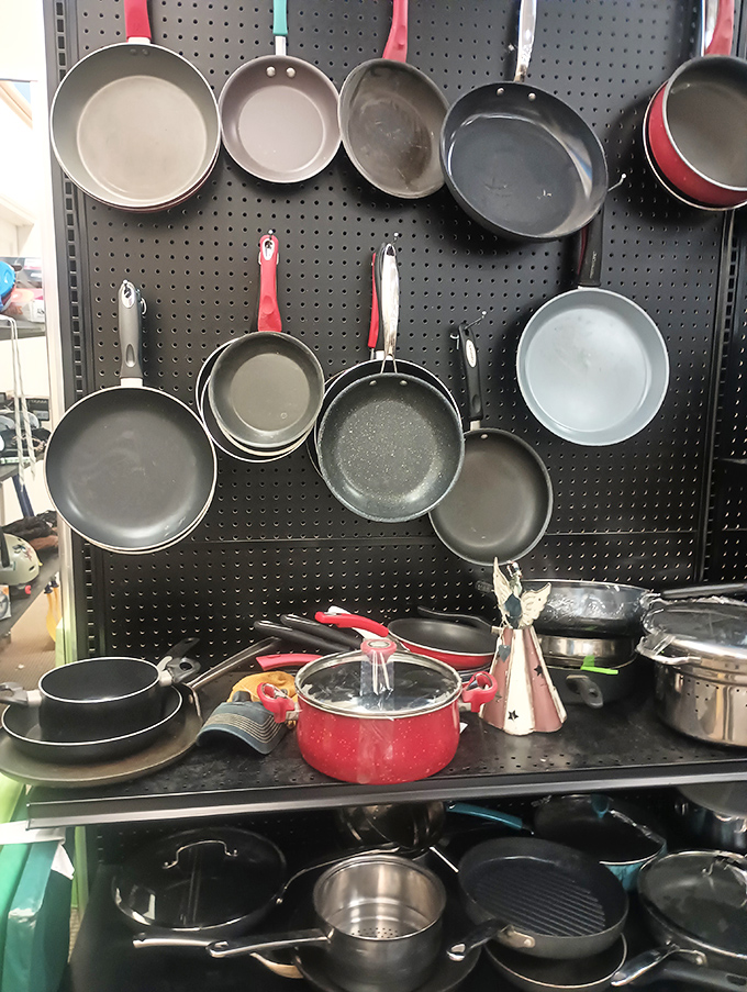 The cookware wall of fame! Those hanging pans have stories to tell&mdash;and meals yet to make. Julia Child would approve of this analog approach to kitchen equipment.