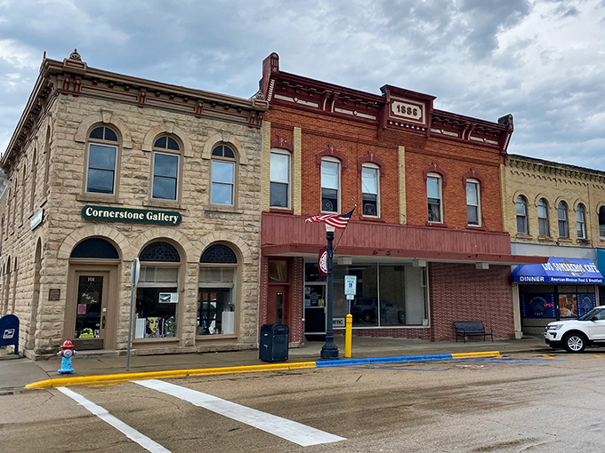 Cornerstone Gallery anchors the downtown with classic limestone dignity, a reminder that art and commerce have coexisted here for generations.