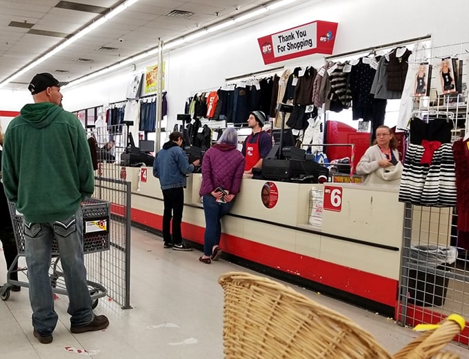 Checkout time: where treasures meet their new owners and staff in red shirts send you off with a "Thank You For Shopping" and the satisfaction of money well spent.