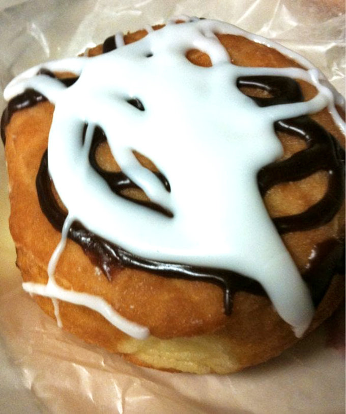 Chocolate and vanilla dancing together on this donut &ndash; a yin-yang of sweetness that makes breakfast feel like a celebration.