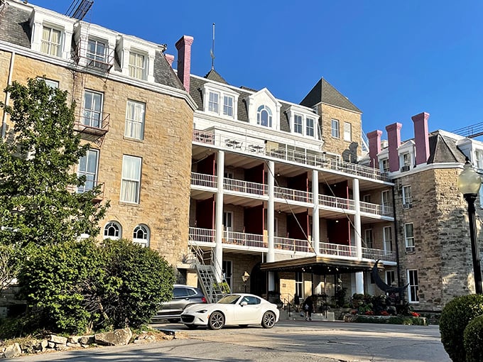 The Crescent Hotel stands majestically on the hillside, its stone facade holding more stories than your uncle after his third glass of bourbon.