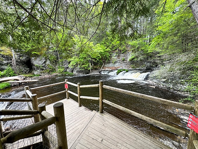 This viewing deck offers front-row seats to nature's greatest show. The gentle curve of the railing frames the water's journey perfectly.