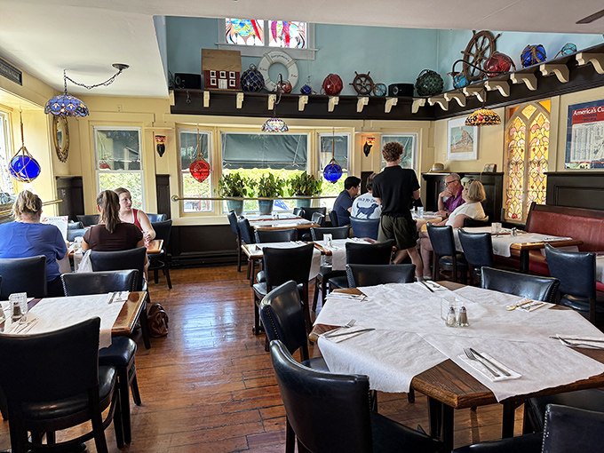 Colorful glass floats and maritime artifacts transform this dining area into a museum where the exhibits are edible.