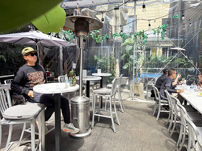 The outdoor patio: where strangers become friends united by the universal language of exceptional food.