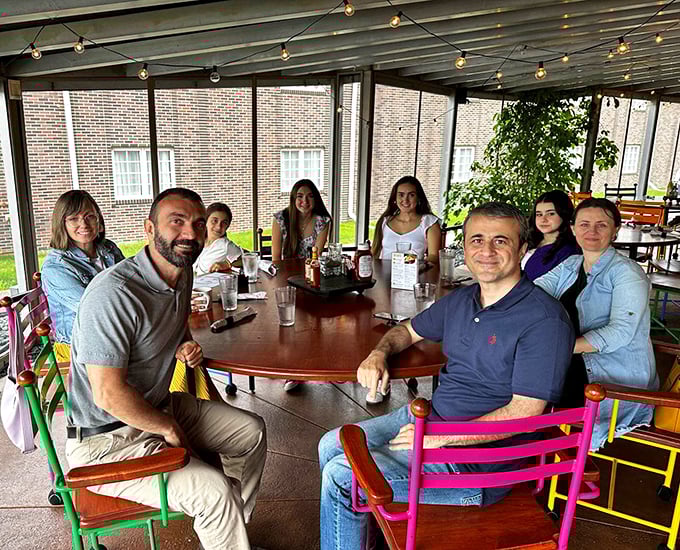 Where memories are made between coffee refills. These colorful chairs add just the right amount of whimsy to serious eating business.