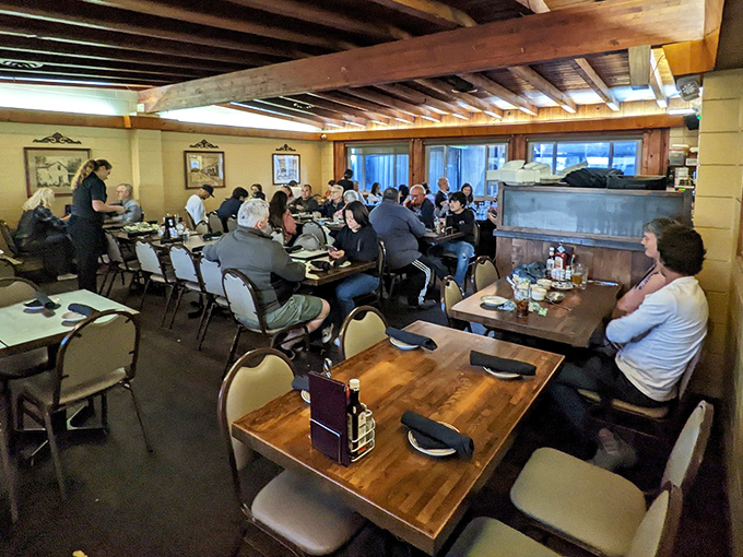 Where strangers become friends over shared appreciation of perfectly grilled meat. Notice how nobody's looking at their phones—they're too busy experiencing food worth remembering.