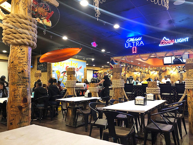 Diners huddle around tables like prospectors who've struck gold. The neon beer signs cast a glow of anticipation.