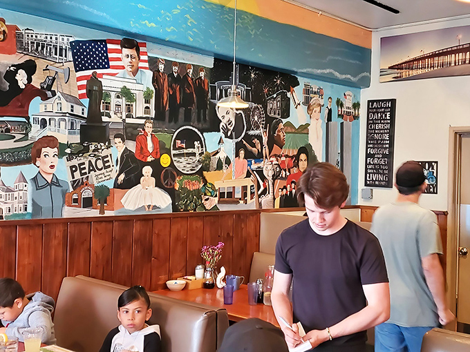 The vibrant mural tells stories while you eat stories—a feast for both your eyes and stomach.