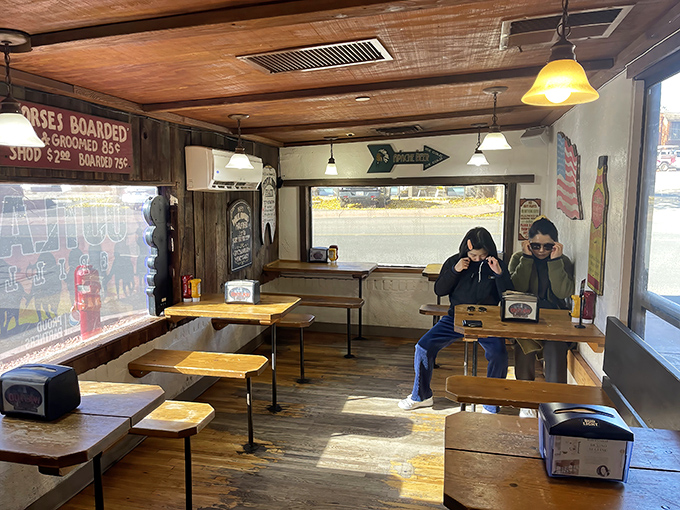 Diners settle in for the kind of meal that turns strangers into friends over shared napkin strategies.