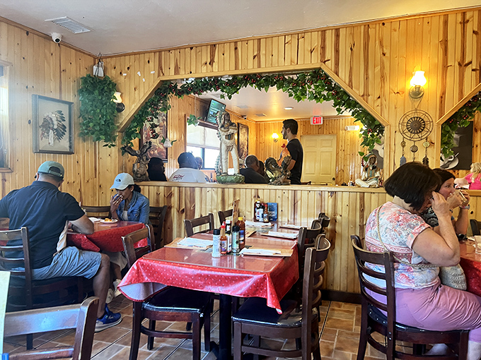 Another angle of the cozy dining space where countless happy meals have unfolded. Those vine-draped archways add a touch of whimsy to serious eating.