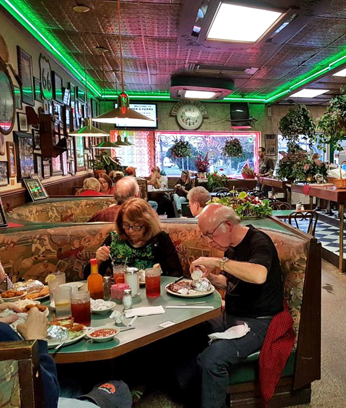 The dining room buzzes with conversation as regulars and road-trippers alike share the universal language of "mmm" between satisfied bites.