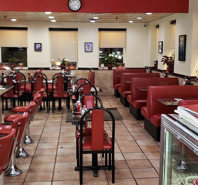 Red booths lined up like soldiers ready for duty &ndash; each one having witnessed countless first dates, family gatherings, and solo diners lost in thought.