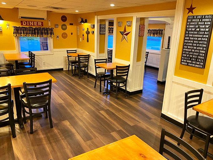 The sunny yellow walls and rustic wood floors create a dining room that feels like your favorite aunt's kitchen&mdash;if she could cook for 50 people at once.