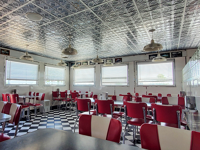 Those red chairs against that black and white floor create a scene Norman Rockwell would've painted admiringly.