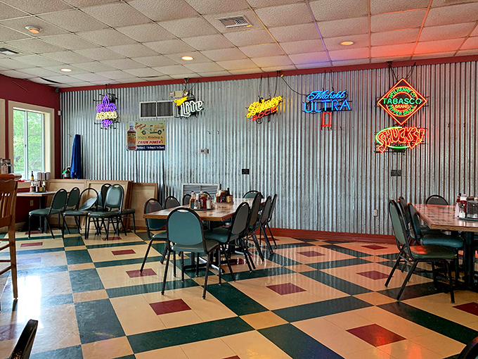 Corrugated metal walls adorned with neon beer signs&mdash;because great seafood doesn't need marble columns to taste like a million bucks.
