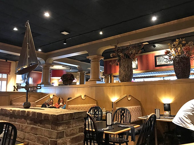 The dining room's architectural details and warm lighting create that rare atmosphere where both celebration and Tuesday dinner feel right at home.