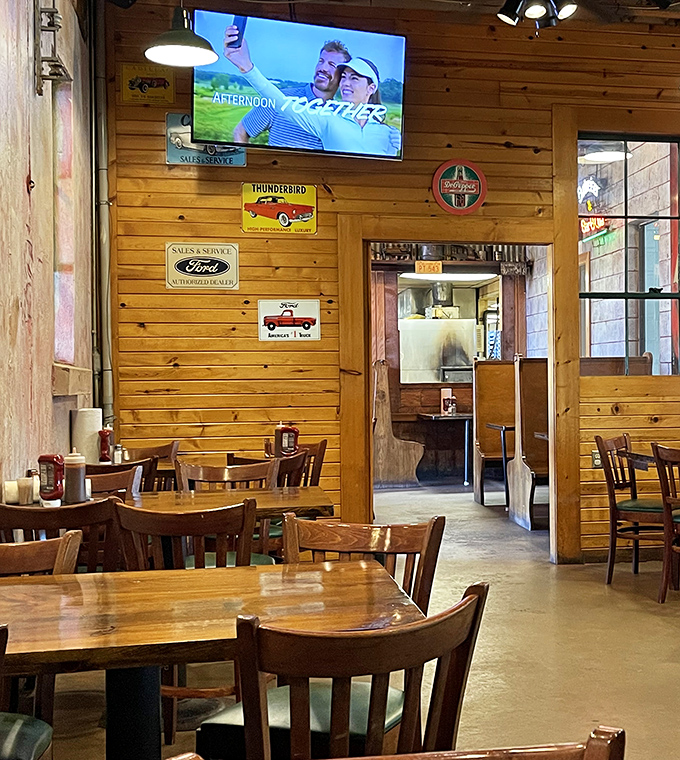 Wood paneling, vintage signs, and the promise of meat sweats. This isn't just a dining room&mdash;it's a barbecue sanctuary where calories don't count.