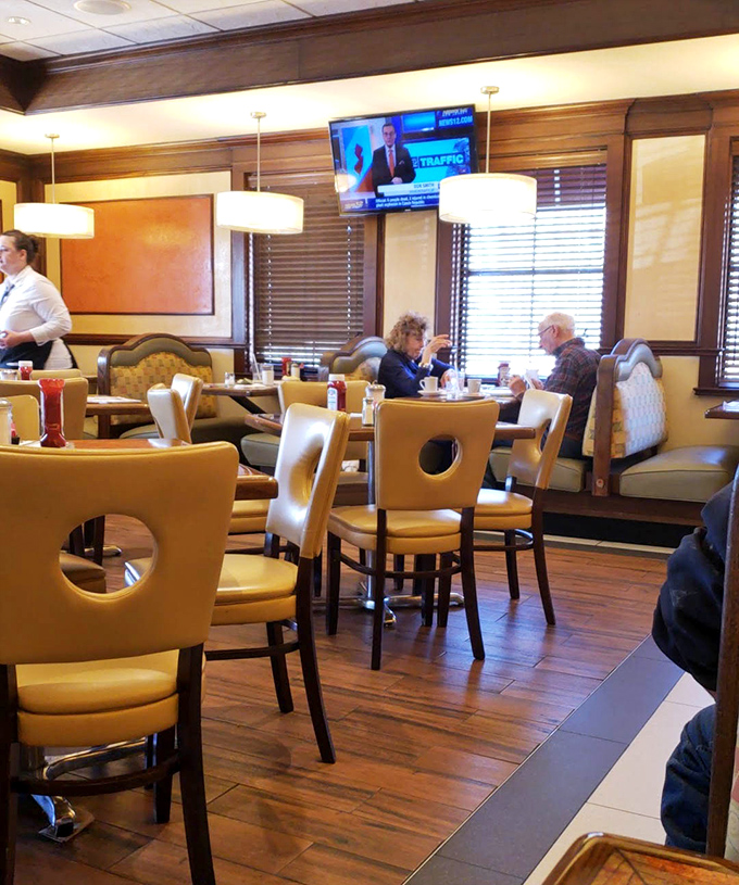 The dining area balances that classic diner feel with modern touches. Those chairs have supported generations of satisfied breakfast enthusiasts.
