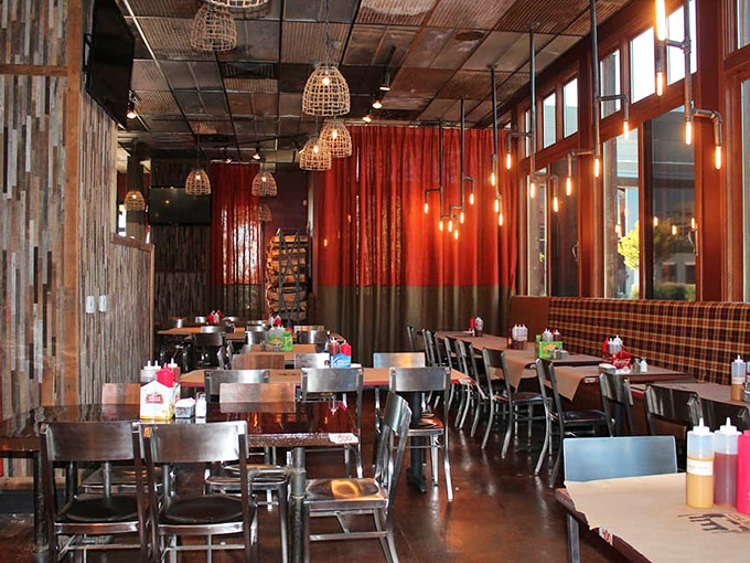 Red curtains and basket pendant lights create a dining space that feels both contemporary and timeless &ndash; like comfort food with a California twist.