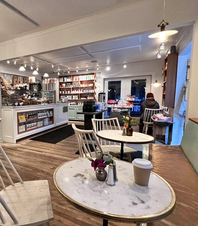 Marble tabletops and bentwood chairs create a space where lingering isn't just allowed&mdash;it's encouraged. The retail section beckons with promises of taking a piece of Persephone home.
