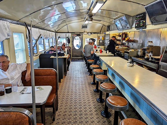 The view down the counter where neighbors become temporary friends united by their mutual appreciation for good breakfast.
