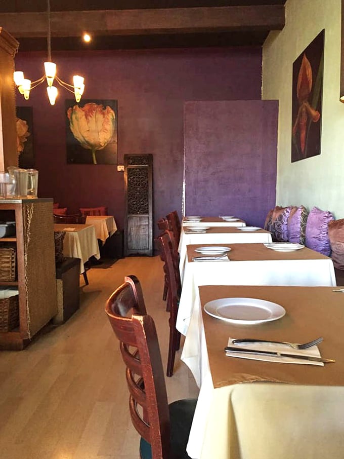 Purple walls and white tablecloths create the perfect backdrop for the colorful flavor explosions about to land on your plate. Elegant without pretension.