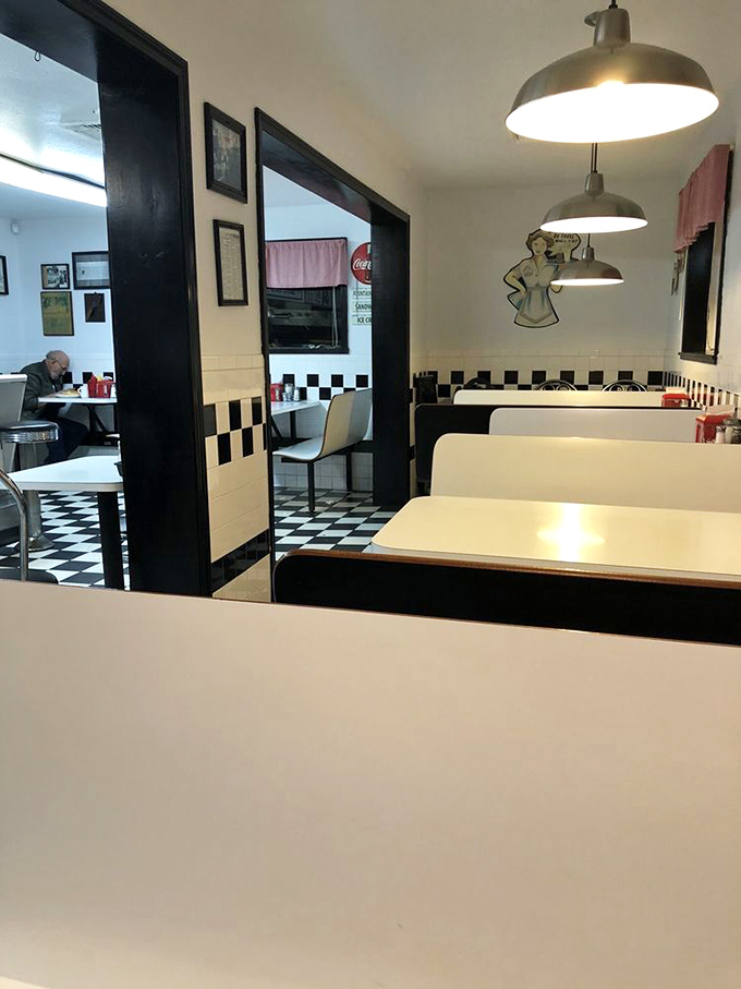 The dining room layout hasn't changed in decades because perfection doesn't need updating. Notice the absence of charging stations?