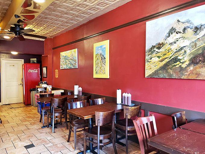 Ornate ceiling tiles and vibrant art create an atmosphere that says, "Yes, we're serious about BBQ, but we're not above having fun with it."