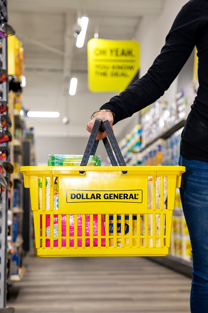 The yellow basket of possibility&mdash;what begins as a quick errand inevitably transforms into a full-scale shopping expedition with each aisle traversed.
