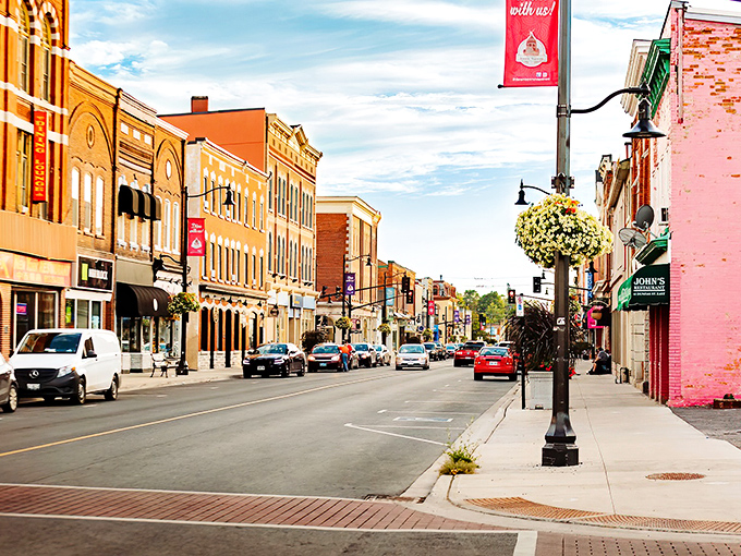 Hanging flower baskets and historic facades create a downtown straight from a Hallmark movie, minus the contrived plot twists.