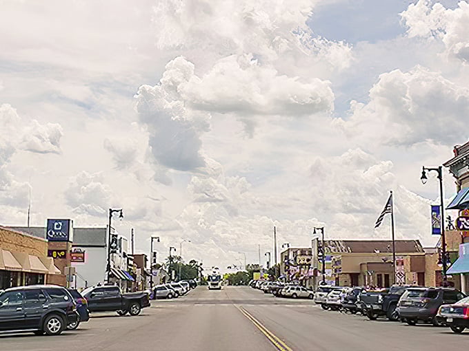 Downtown Miller's classic storefronts line up like old friends, sharing stories beneath dramatic prairie clouds.