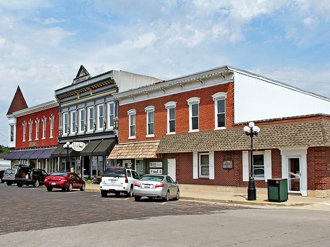Downtown's brick facades have witnessed generations of Arcola stories, each building holding secrets behind those vintage windows.