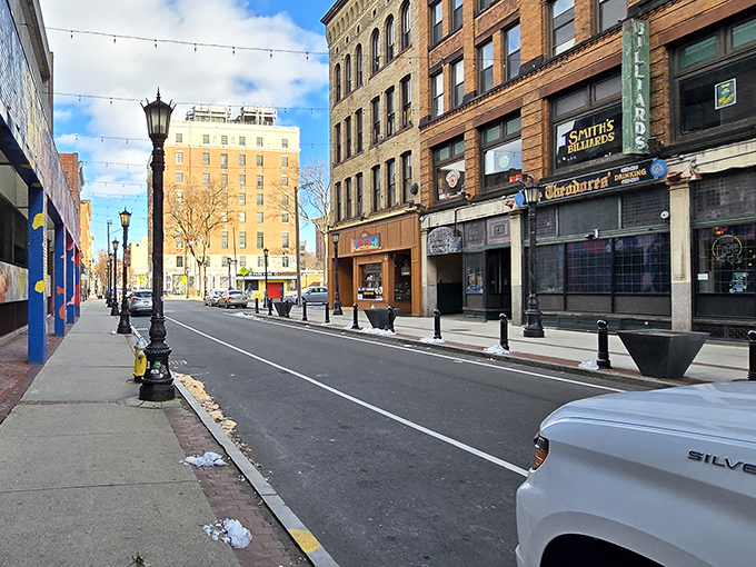 Historic storefronts line Springfield's revitalized streets, where local businesses thrive in beautifully preserved buildings without the astronomical rents of larger cities.
