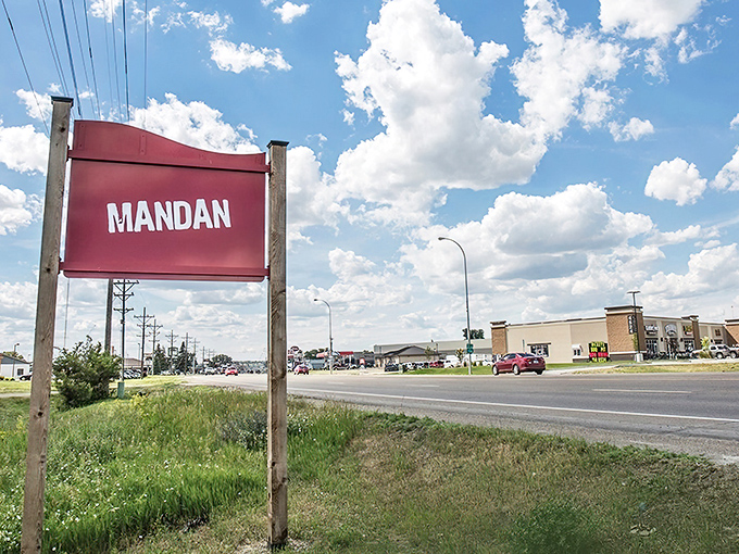 That simple "MANDAN" sign doesn't need fancy embellishment &ndash; it's confident in what it's marking: a place worth discovering.