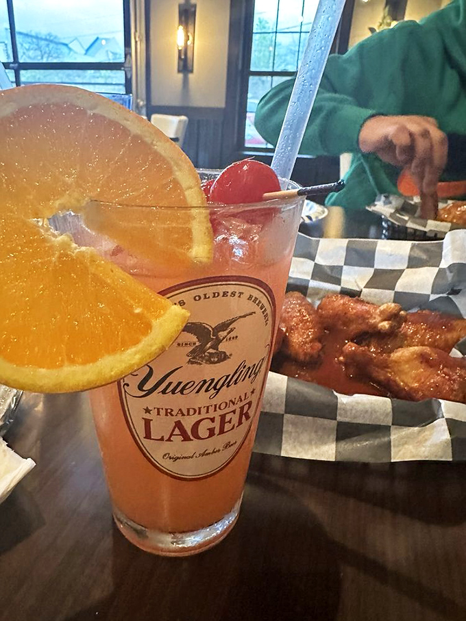 That's not just a drink&mdash;it's vacation in a glass, complete with a citrus sun rising over a sea of refreshment. Perfect sidekick to spicy wings.