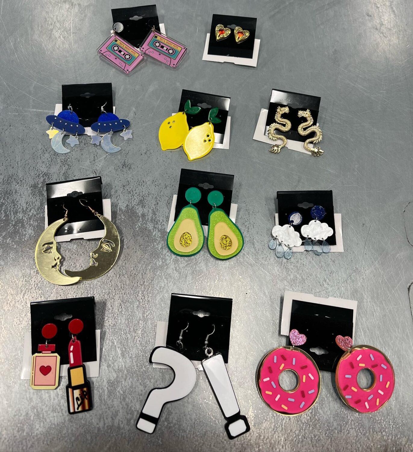 Quirky earrings that range from "job interview appropriate" to "attending a donut-themed music festival." Those avocados are particularly tempting.