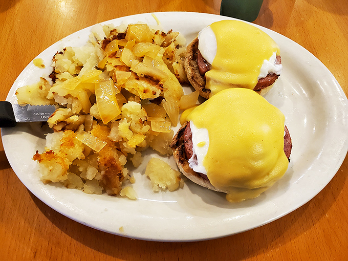 Eggs Benedict that would make the Pope himself convert to the Church of Breakfast. Those home fries are doing the Lord's work too!