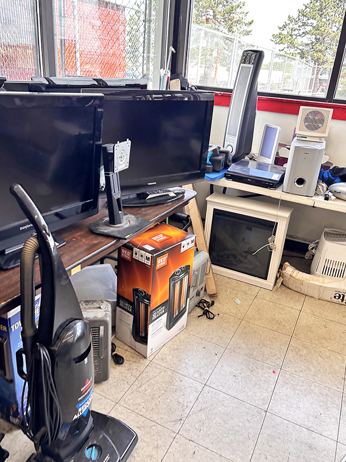 Flat screens and sound systems prove one person's outdated technology is another person's brand new entertainment center dreams.