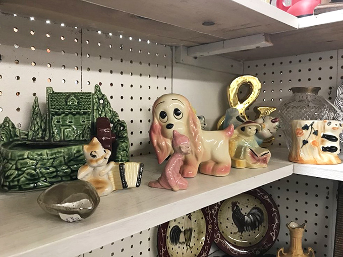 Ceramic creatures with questionable artistic merit but undeniable charm. That pink and white dog has been waiting decades for someone to appreciate its quirky appeal.