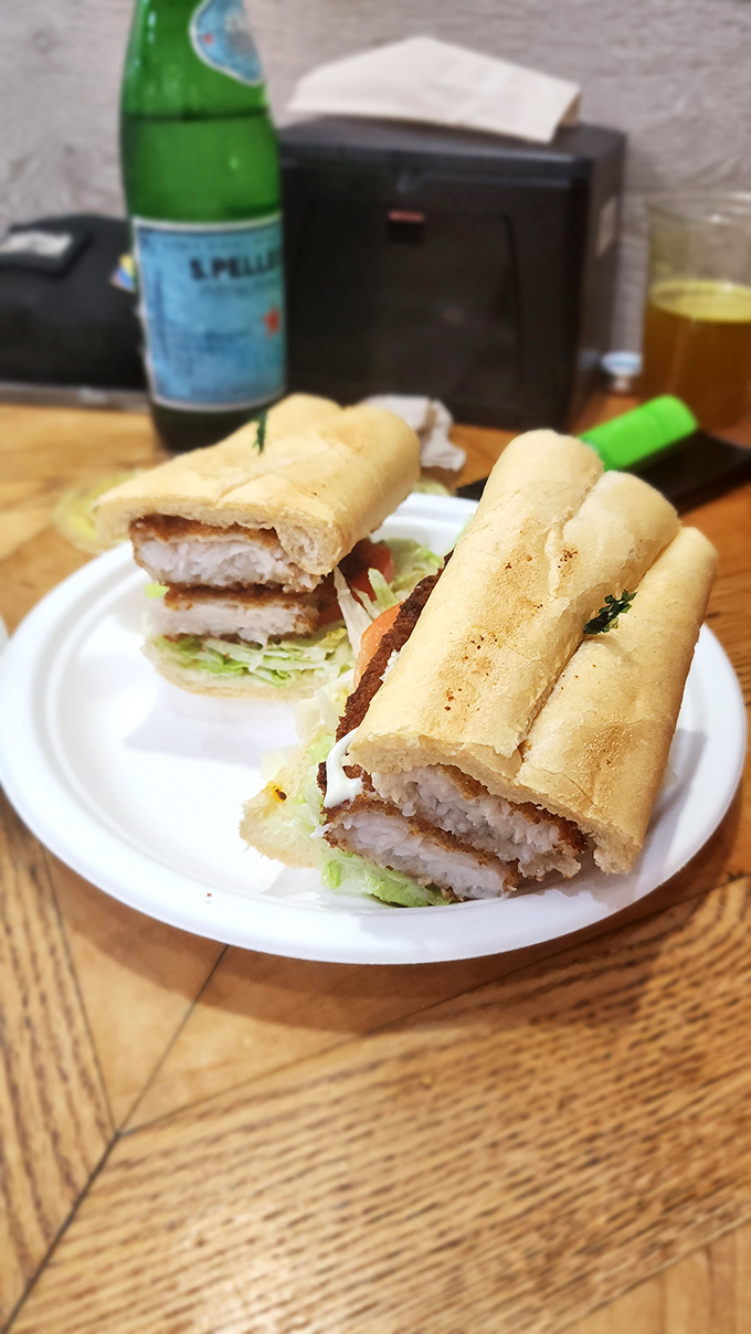 The fish sandwich – proof that seafood and Cuban bread were meant for each other, with a side of zesty green sauce.