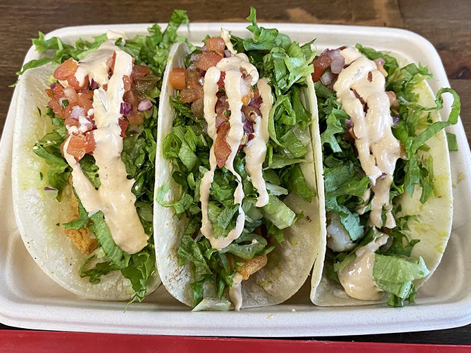 Fish tacos that bring a touch of coastal California to Connecticut &ndash; fresh, bright, and topped with a drizzle of creamy sauce.