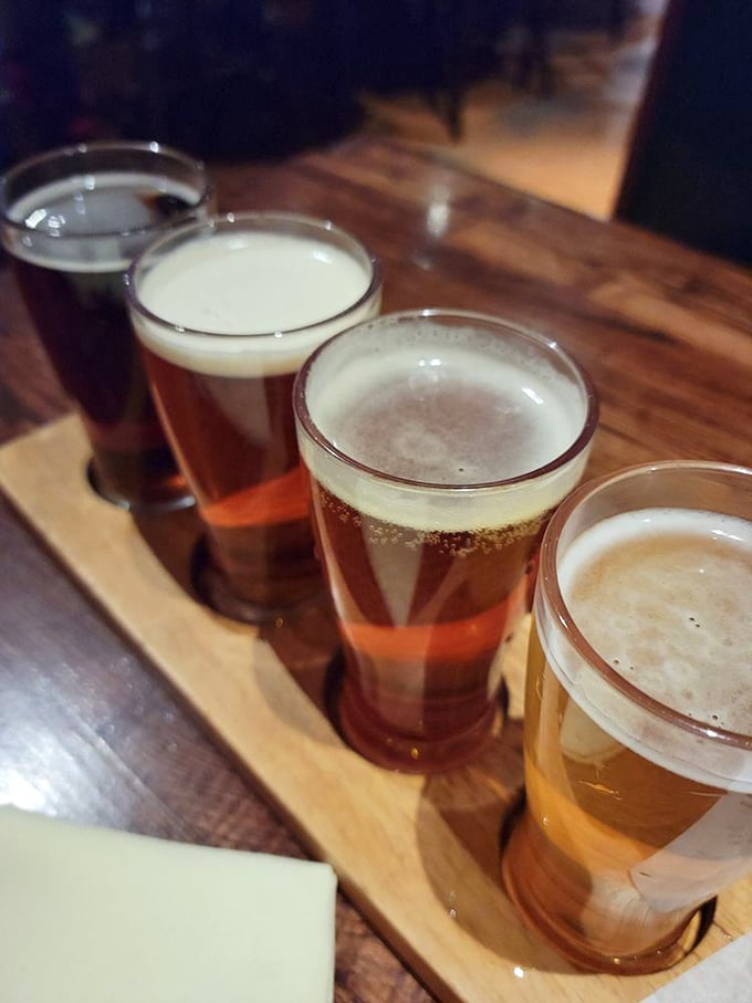 A flight of liquid happiness showcasing craft beers in varying amber hues&mdash;because sometimes one perfect beer just isn't enough.