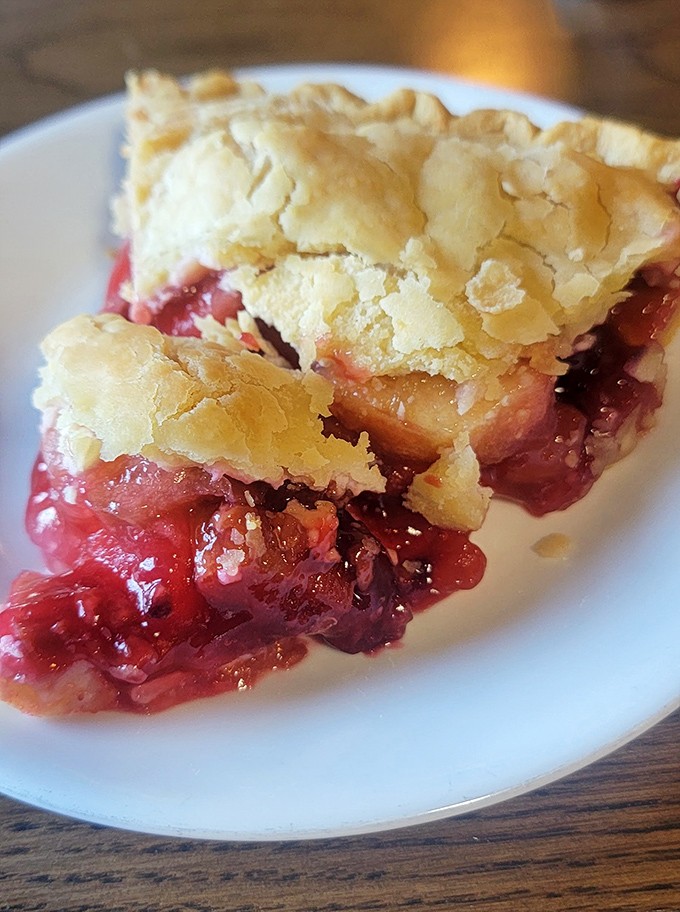 A slice of berry pie that's bursting with fruit and topped with flaky, buttery crust. Grandma would approve&mdash;and maybe be a little jealous.